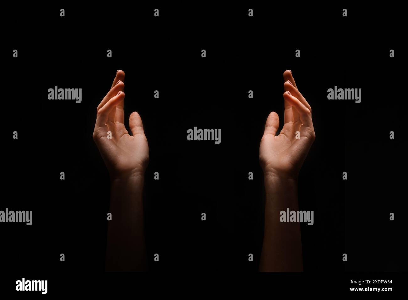 Two Woman Hands Reaching Upward In Darkness Stock Photo - Alamy