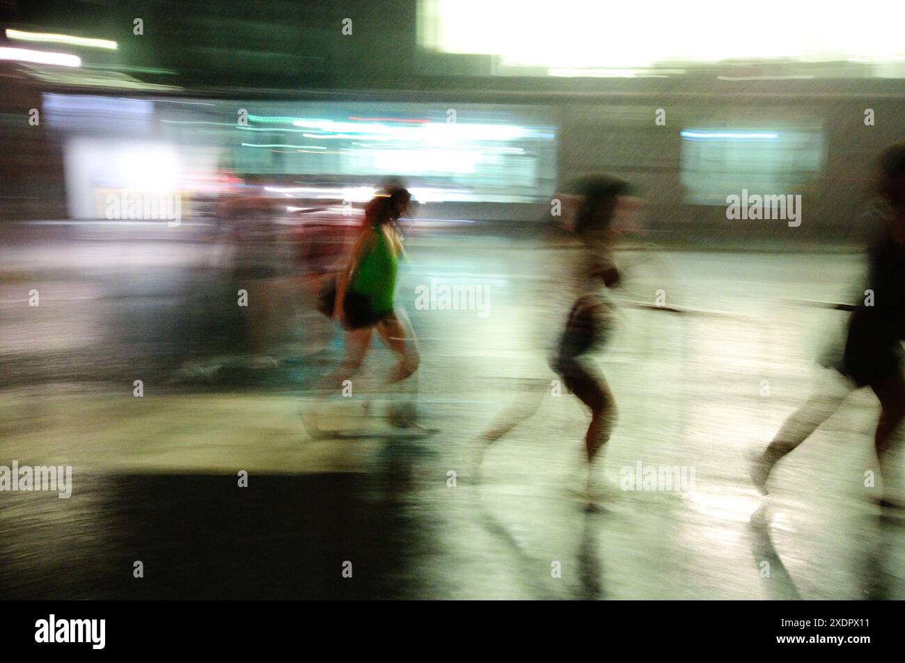 Germany, Berlin, Person Walking in Rain Stock Photo - Alamy