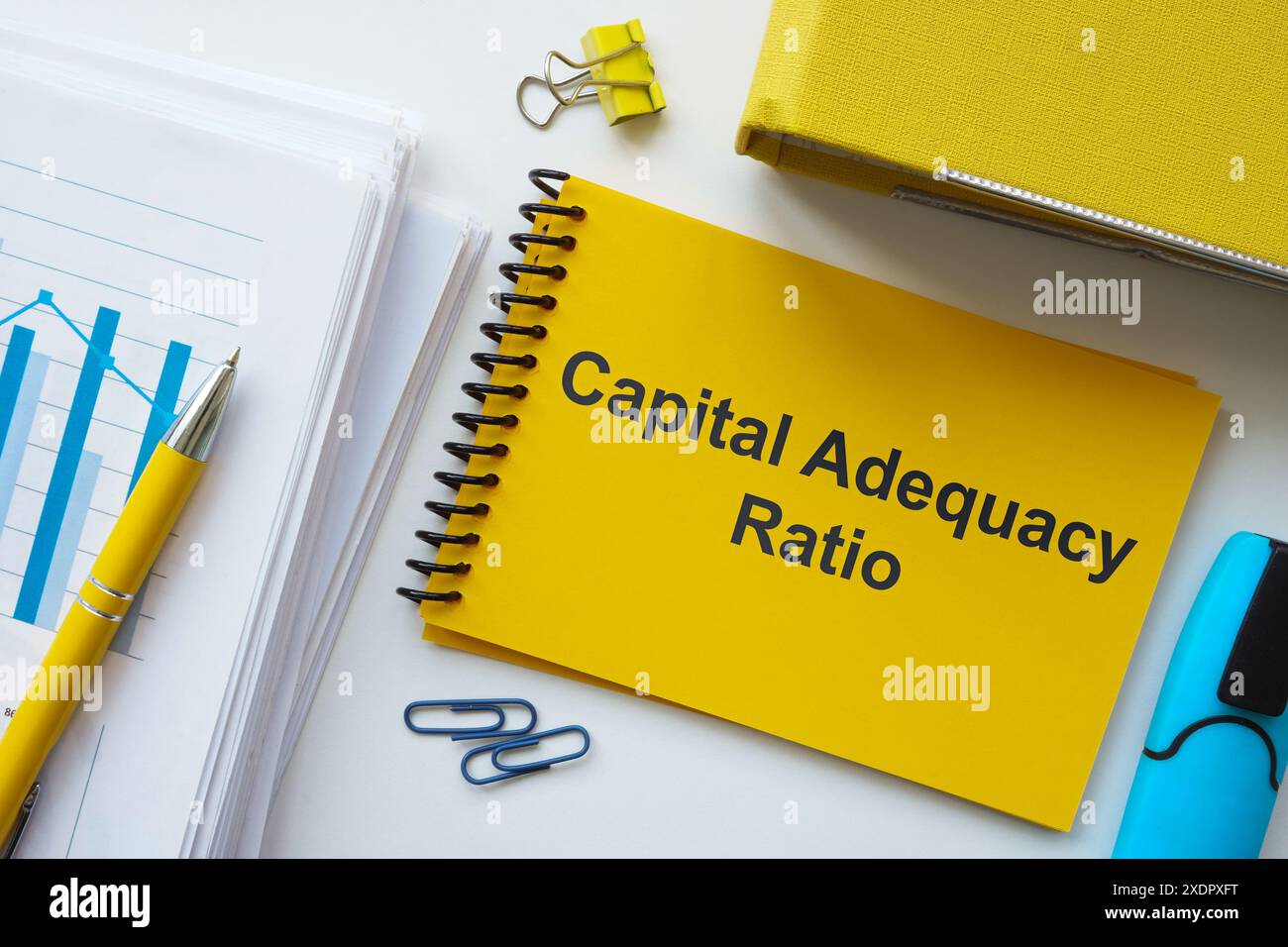 Open notepad with capital adequacy ratio and financial report Stock ...