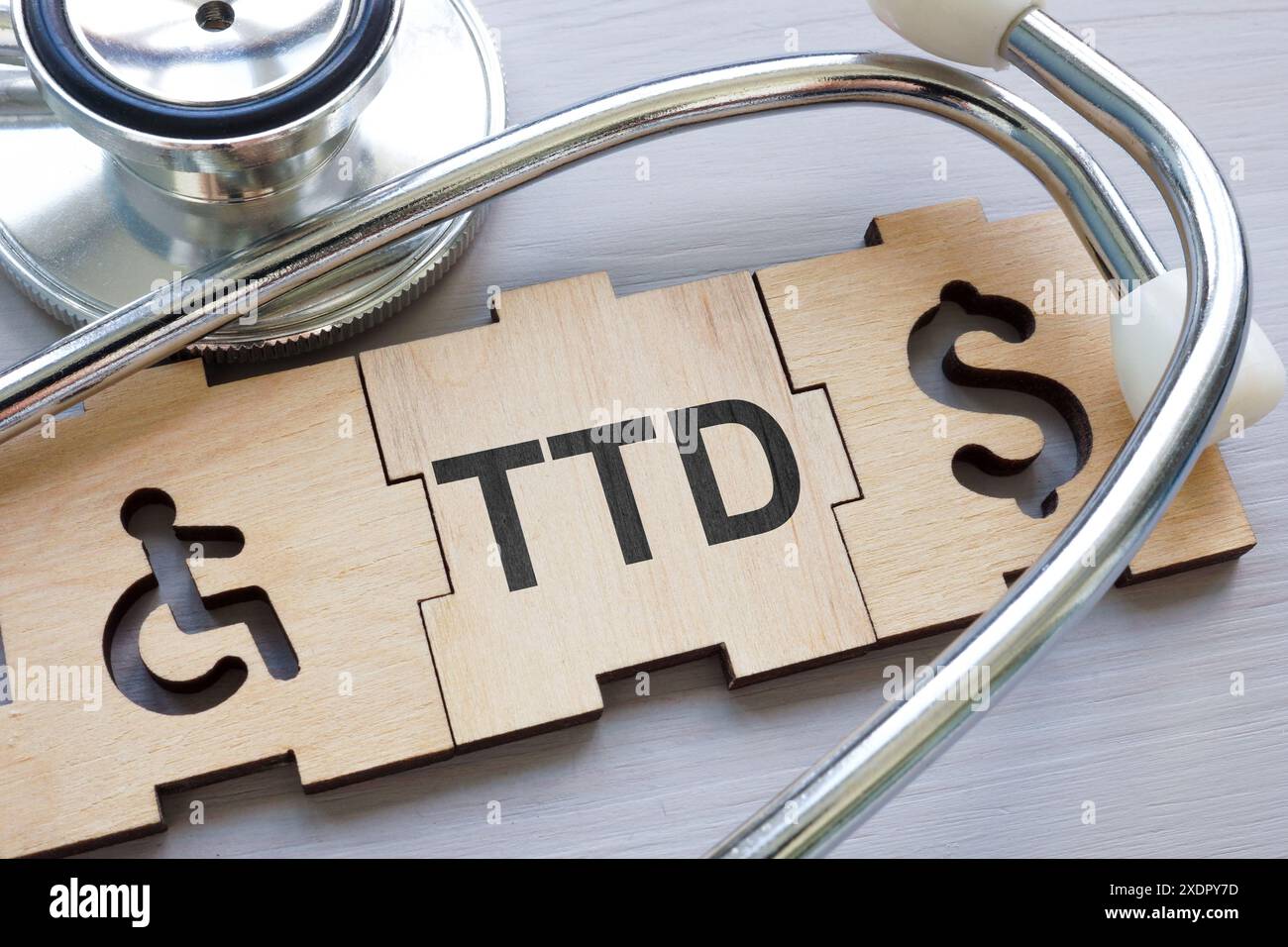 TTD Temporary total disability abstract. Puzzle pieces and a ...