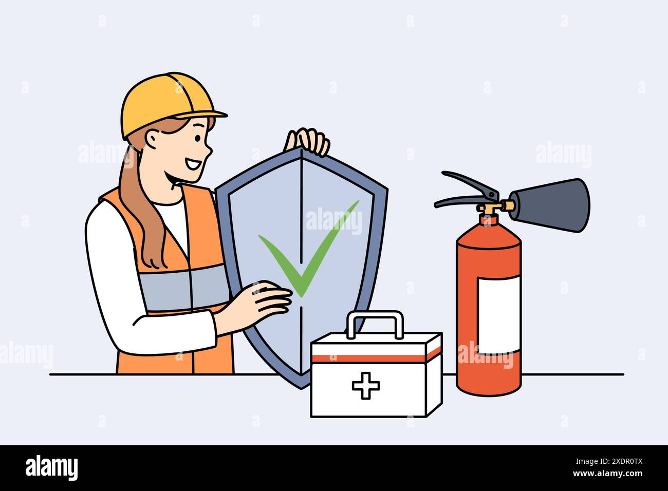 Woman safety specialist, stands near table with first aid kit and fire ...