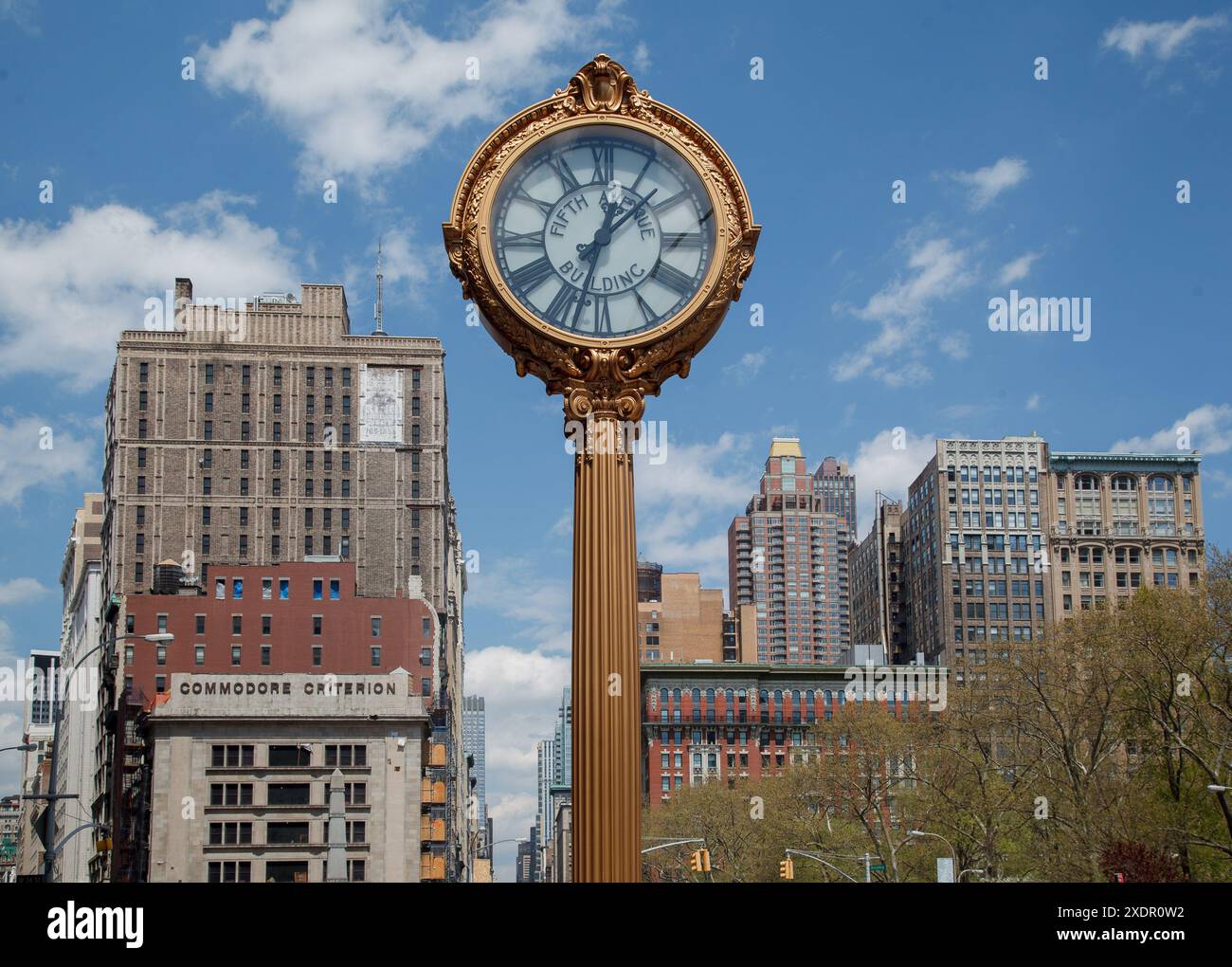 The iconic Fifth Avenue building gilded historic clock in Madison ...