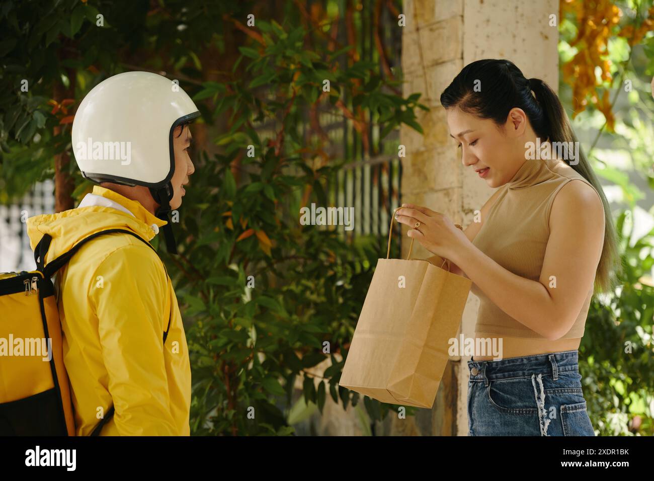 Man getting takeaway delivery hi-res stock photography and images - Alamy
