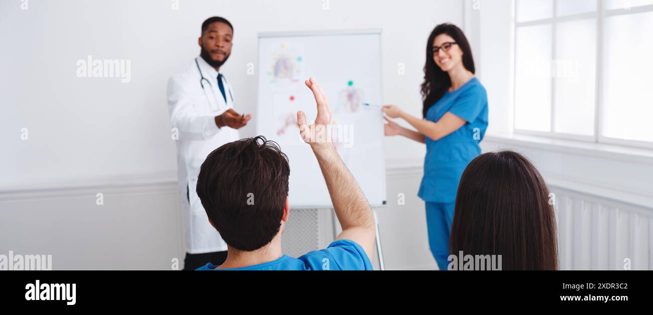 Medical Education. Doctors Giving Lecture To Interns At Seminar Stock ...