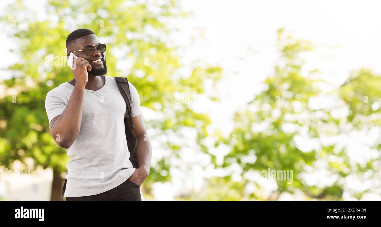 Talking outdoors black hi-res stock photography and images - Alamy