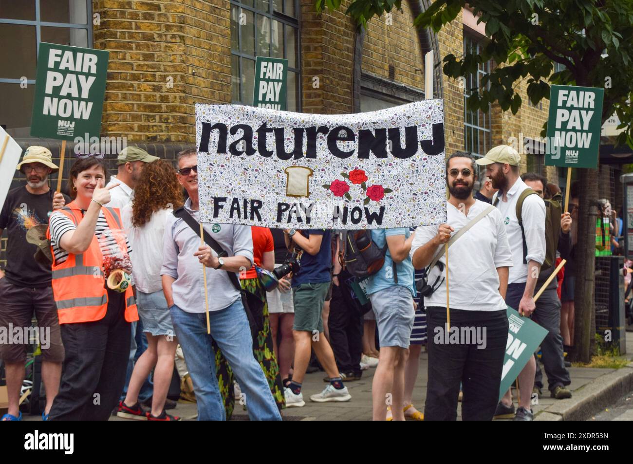 London, UK. 24th June 2024. Springer Nature staff stand at the NUJ ...