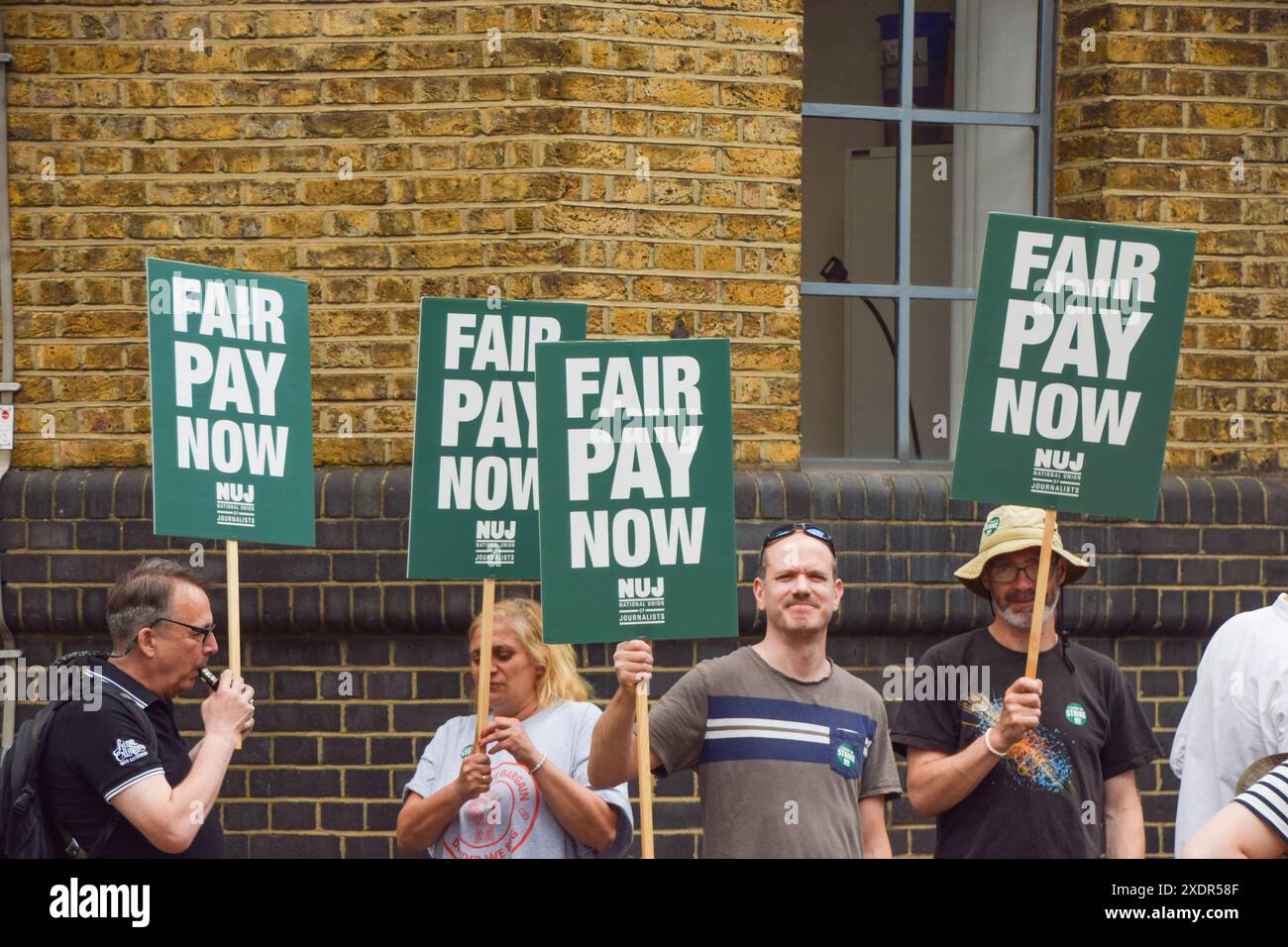 London, UK. 24th June 2024. Springer Nature staff stand at the NUJ ...