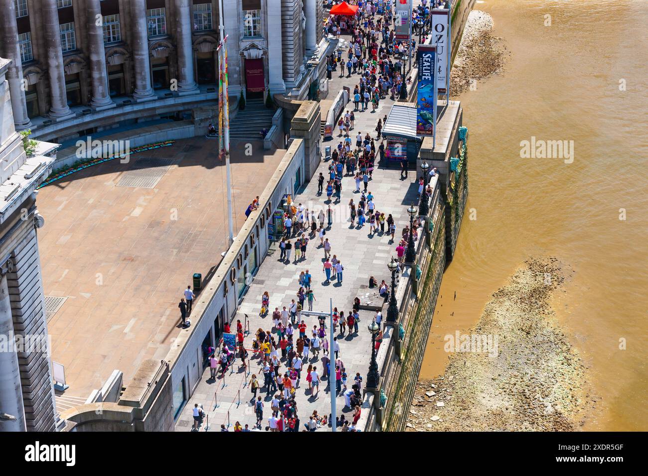 London, United Kingdom - July 3, 2010 : The Queen's Walk on south bank ...