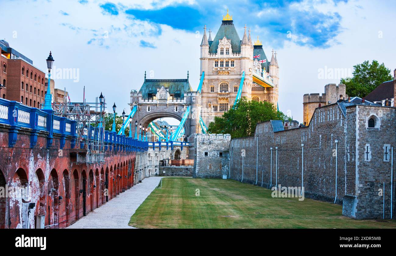 The Tower of London and Tower Bridge. Lawned area between the tower and ...
