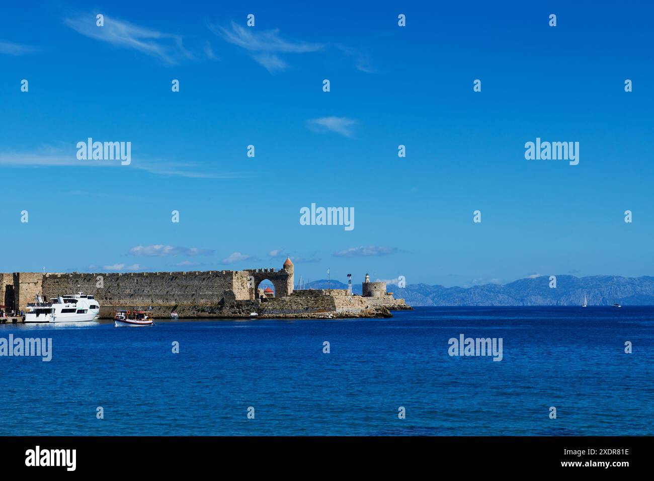 The Ancient walled city along the coastline of Rhodes, Greece, Europe ...
