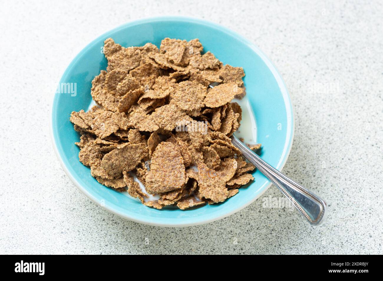 A bowl of bran flakes with milk Stock Photo - Alamy