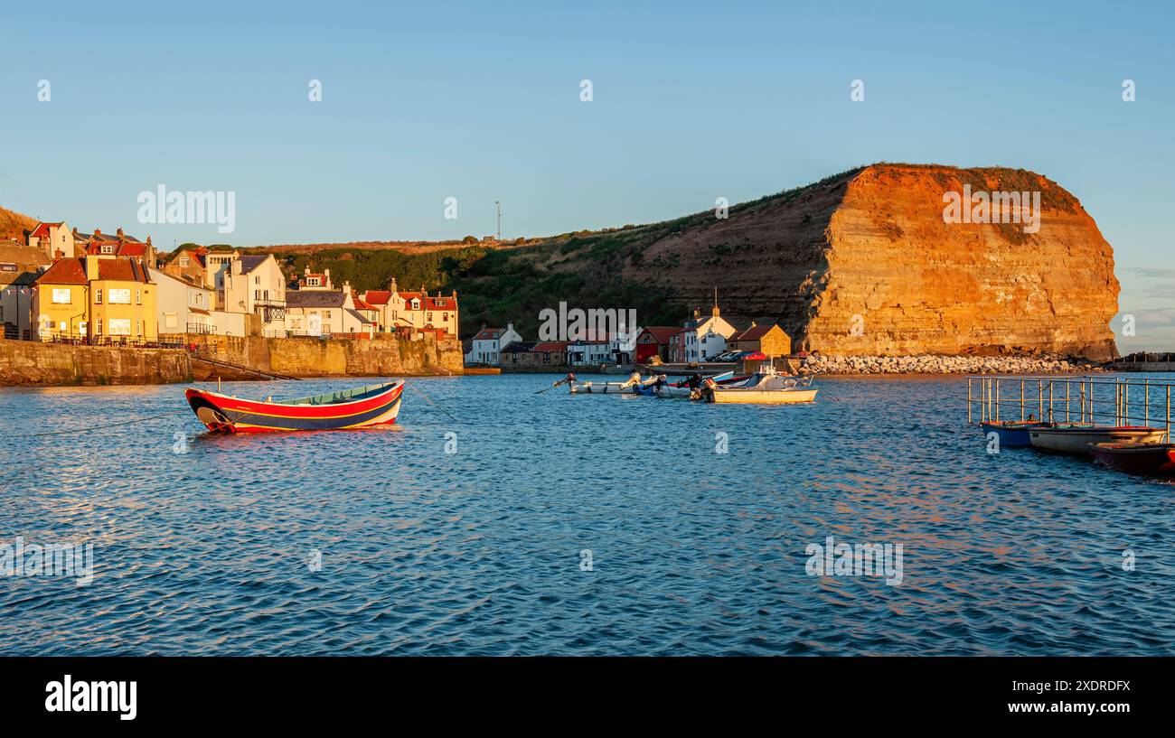 Fishing Cobbles in Staithes Harbour Stock Photo - Alamy