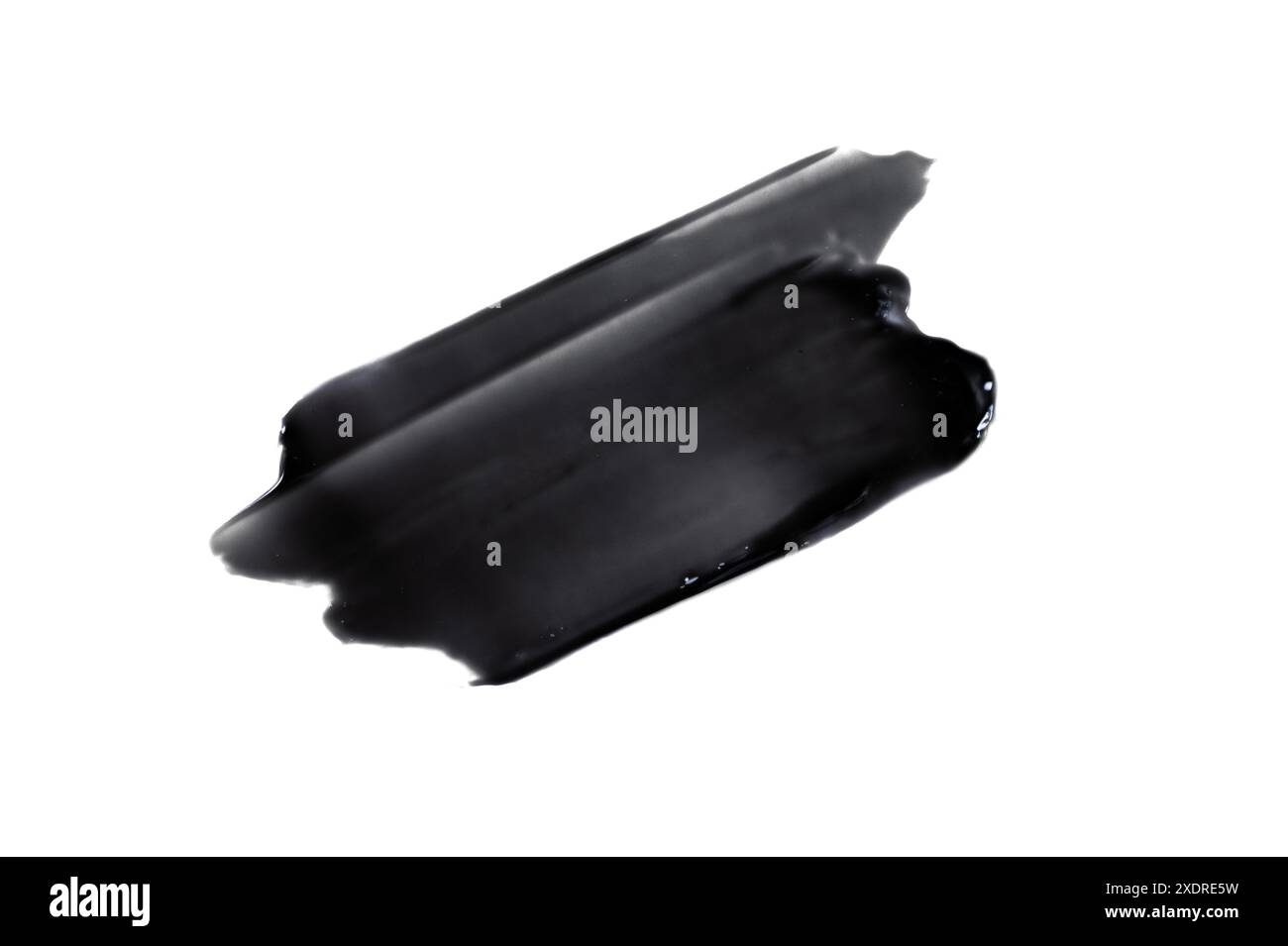 Black charcoal face mask smear isolated on white background. Abstract ...