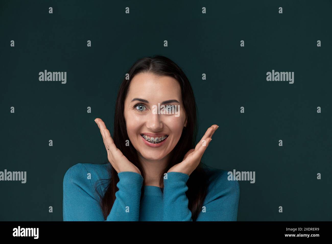 Woman Making a Funny Face With Her Hands Stock Photo - Alamy