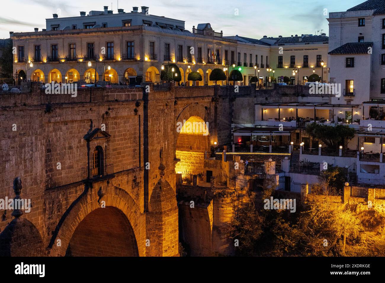 The Puente Nuevo bridge in Ronda at sunset, Andalusia, Spain Stock ...