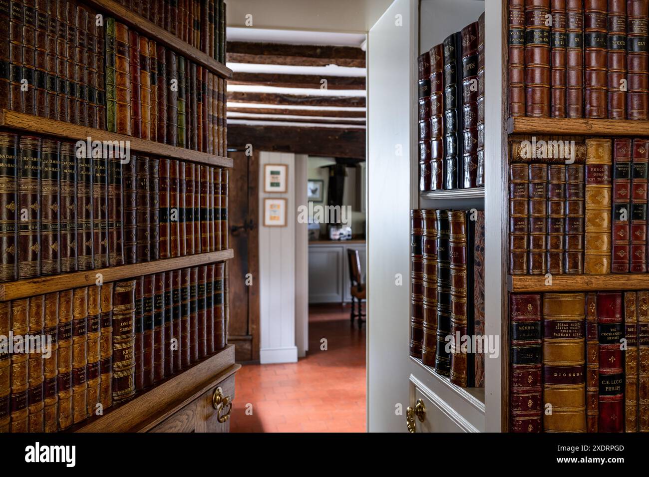 Secret door from library extension in 16th century Tudor farmhouse ...