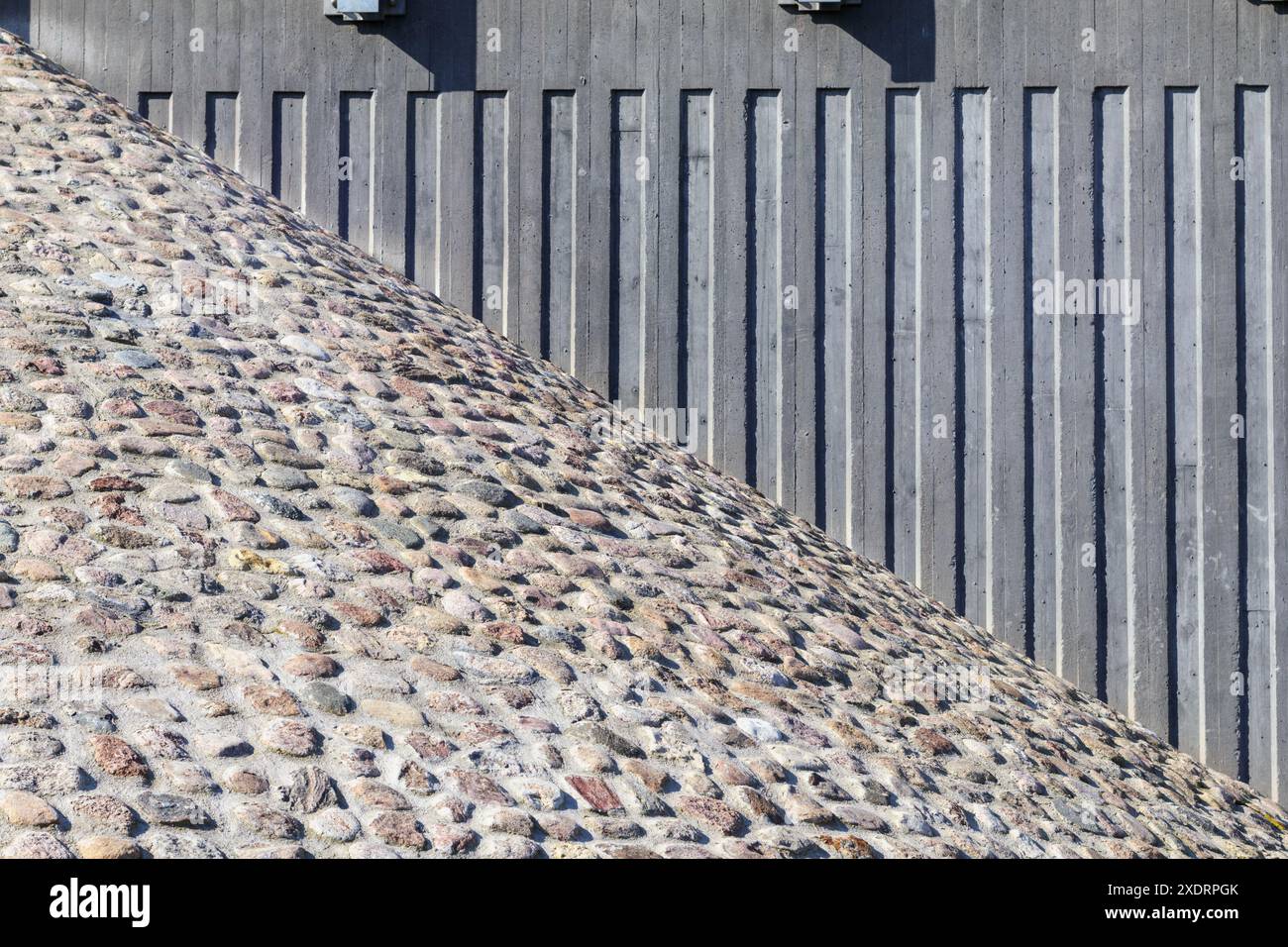 metal vertical wall with stone masonry texture background Stock Photo ...