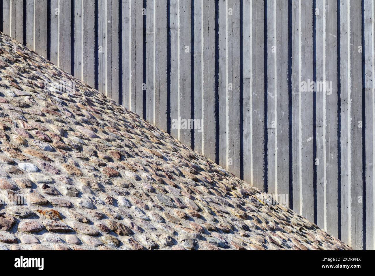 metal vertical wall with stone masonry texture background Stock Photo ...
