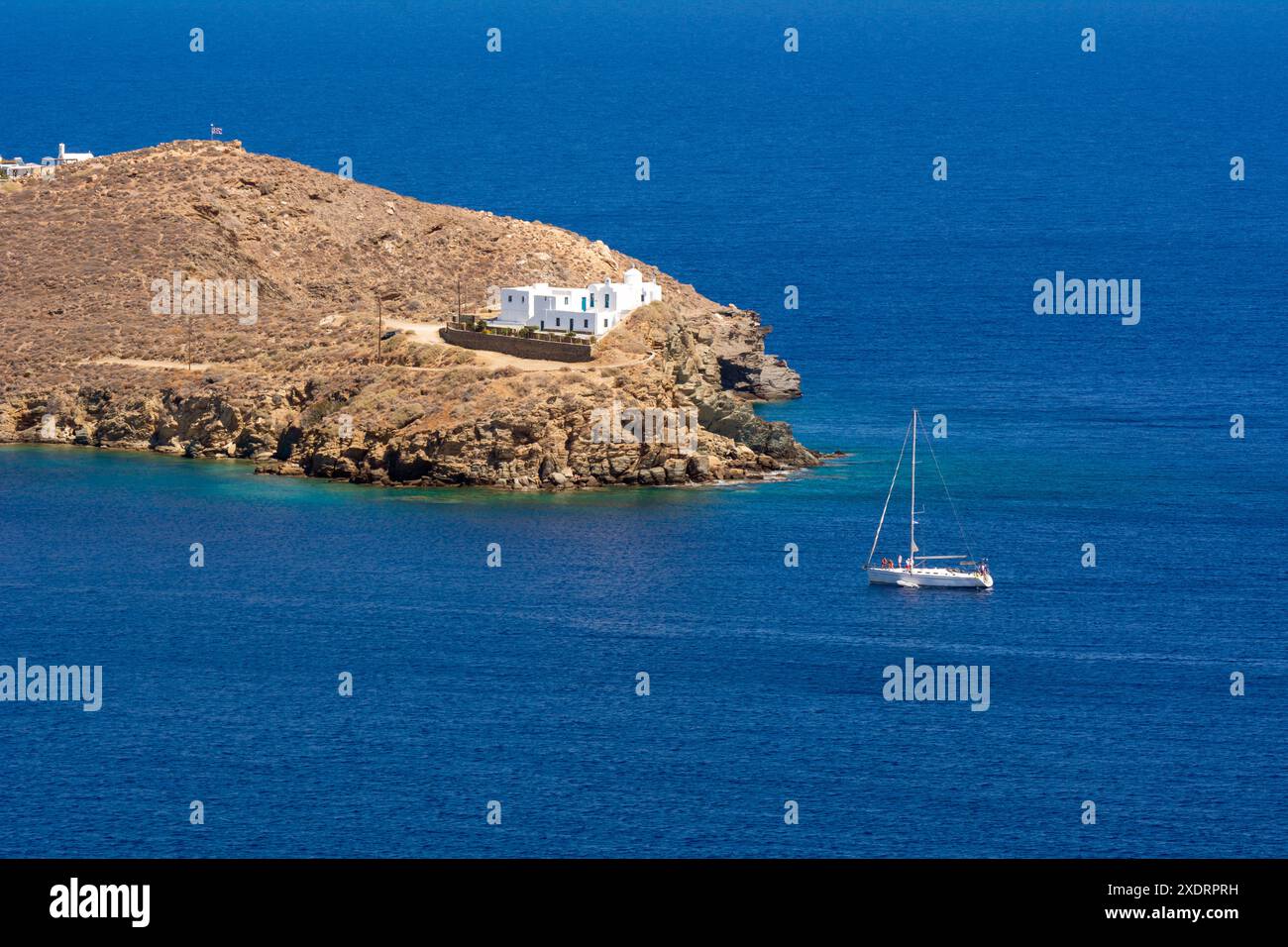 Timios Stavros monastery located on a rocky peninsula on the island of ...