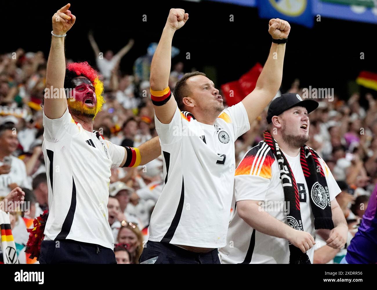 Germany fans celebrate after Niclas Fullkrug scores their side's first ...