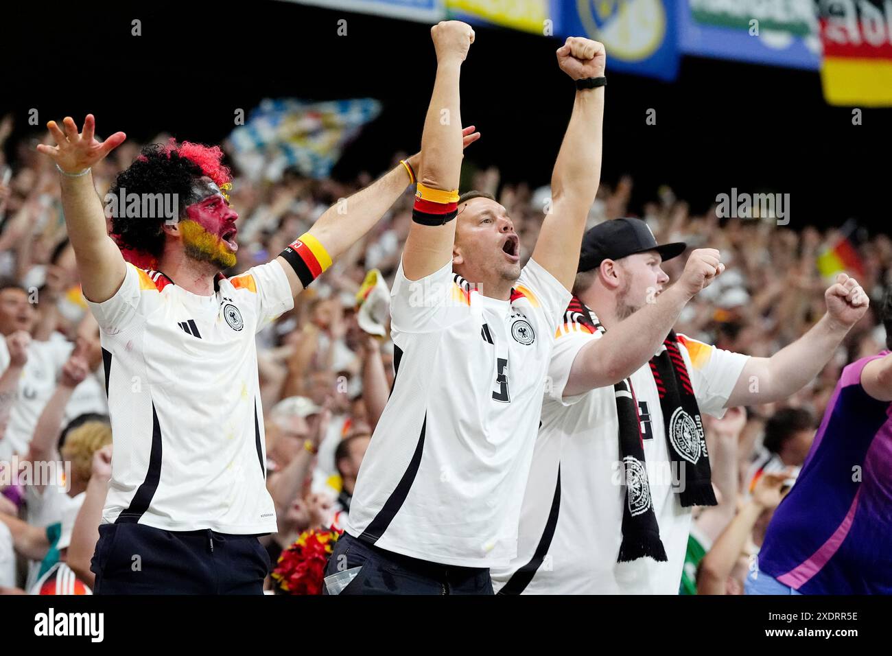Germany fans celebrate after Niclas Fullkrug scores their side's first ...