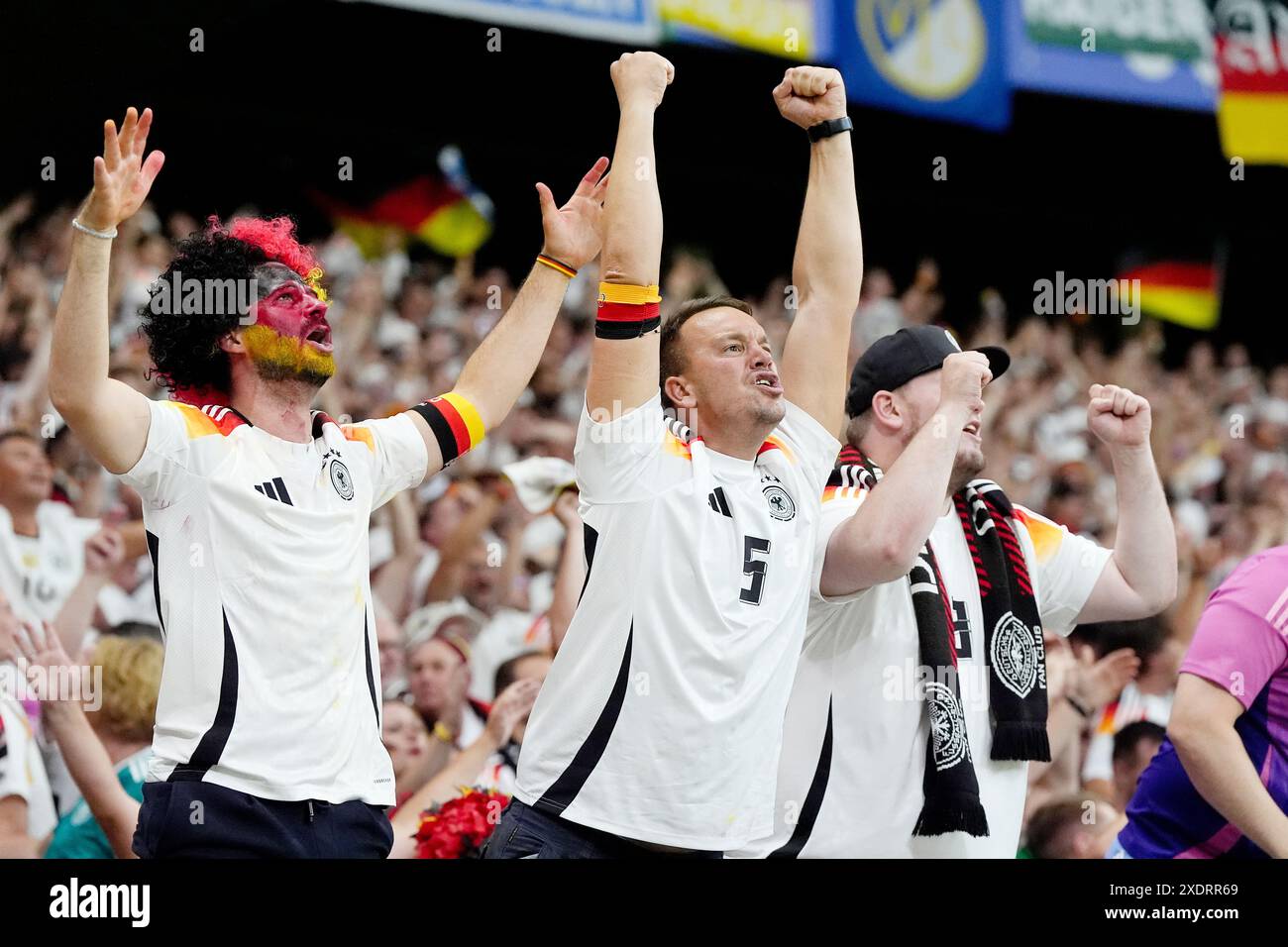 Germany fans celebrate after Niclas Fullkrug scores their side's first ...