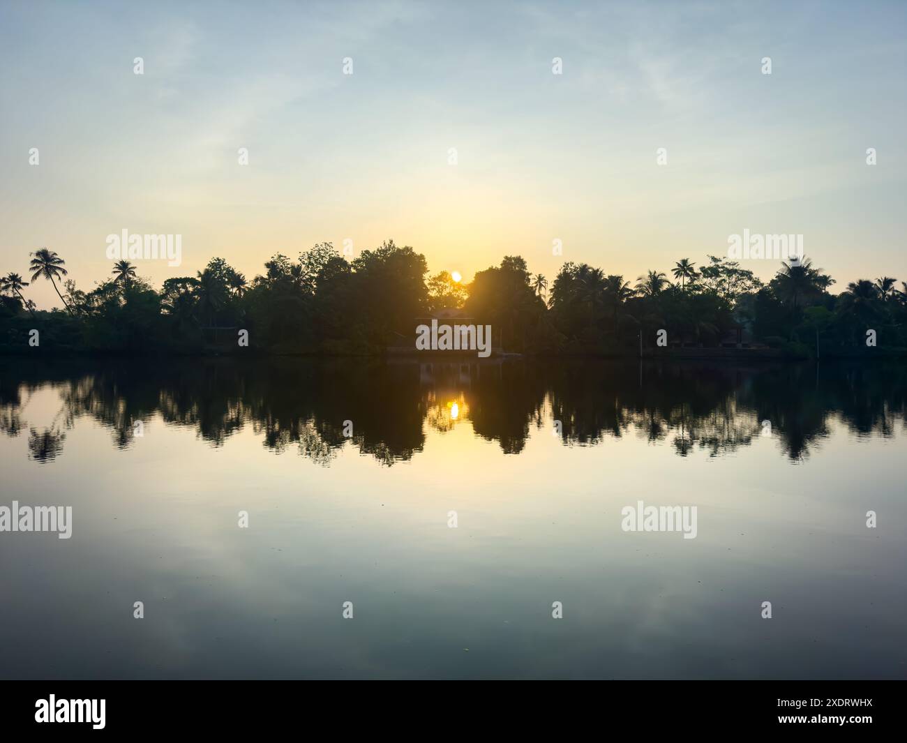 Beautiful symmetrical reflection view of the kochi backwaters in the ...