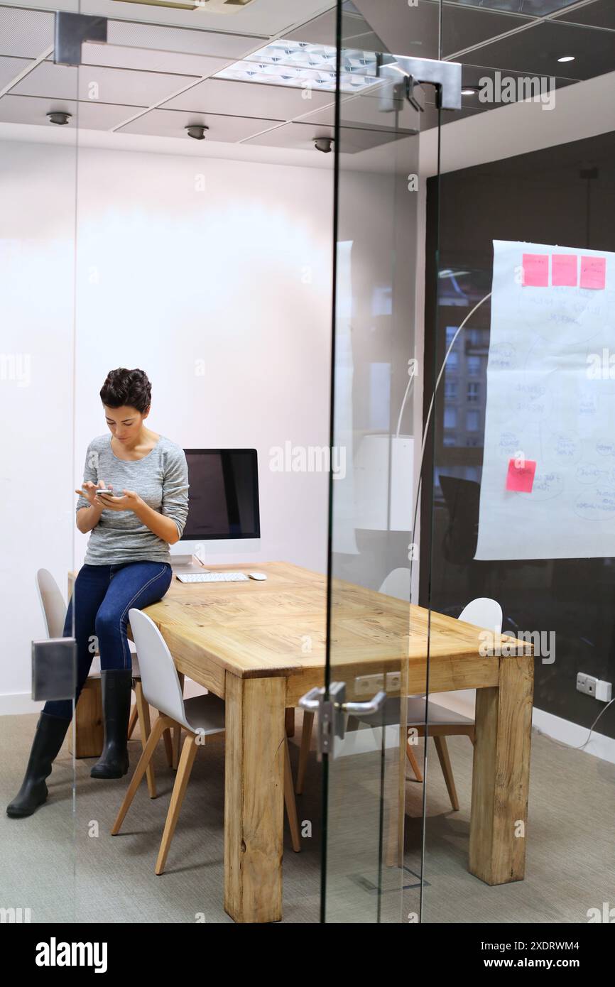 Executive woman in meeting room. Advertising agency Stock Photo - Alamy