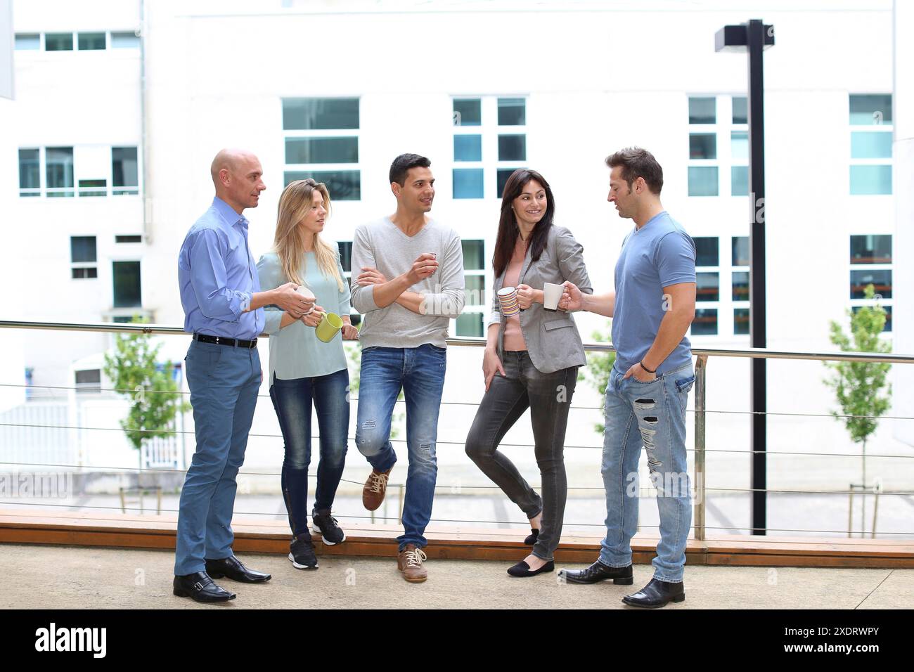Executives drinking coffee break hi-res stock photography and images ...