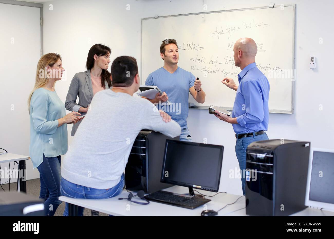 Group of teachers. Computer Academy Stock Photo - Alamy