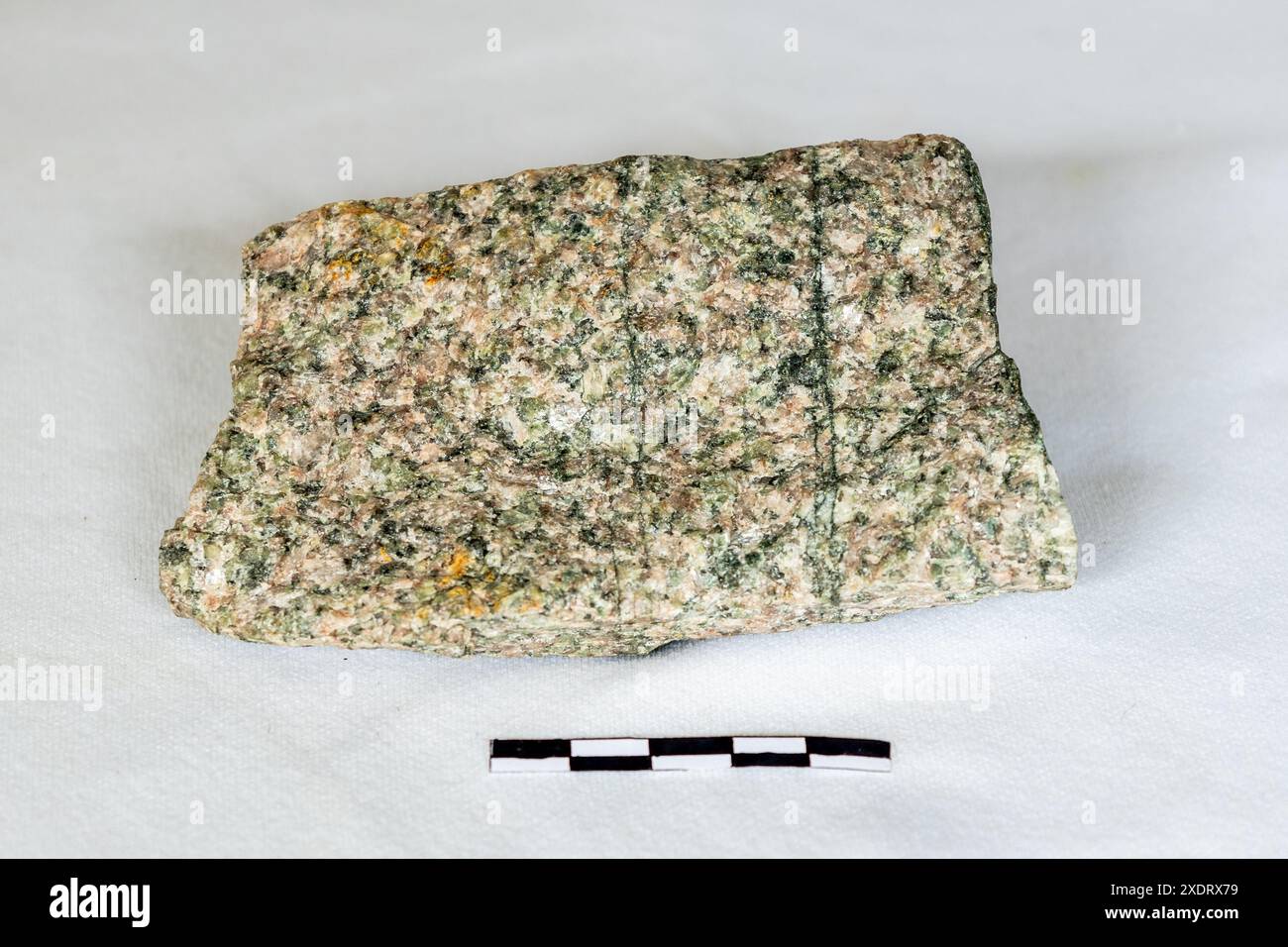 A sample of Archean aged pink and green coloured alkaline granite with ...