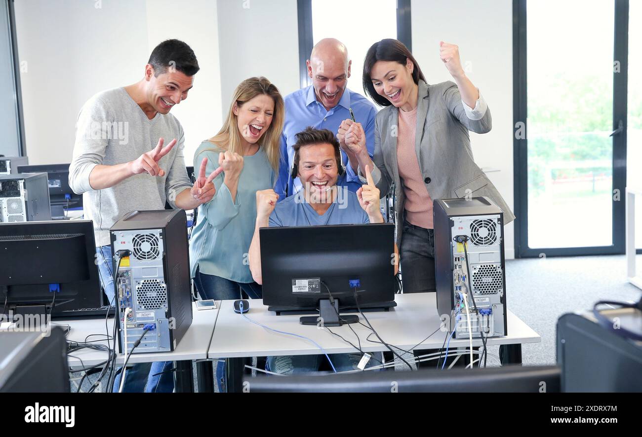 Team teachers. Computer Academy Stock Photo - Alamy