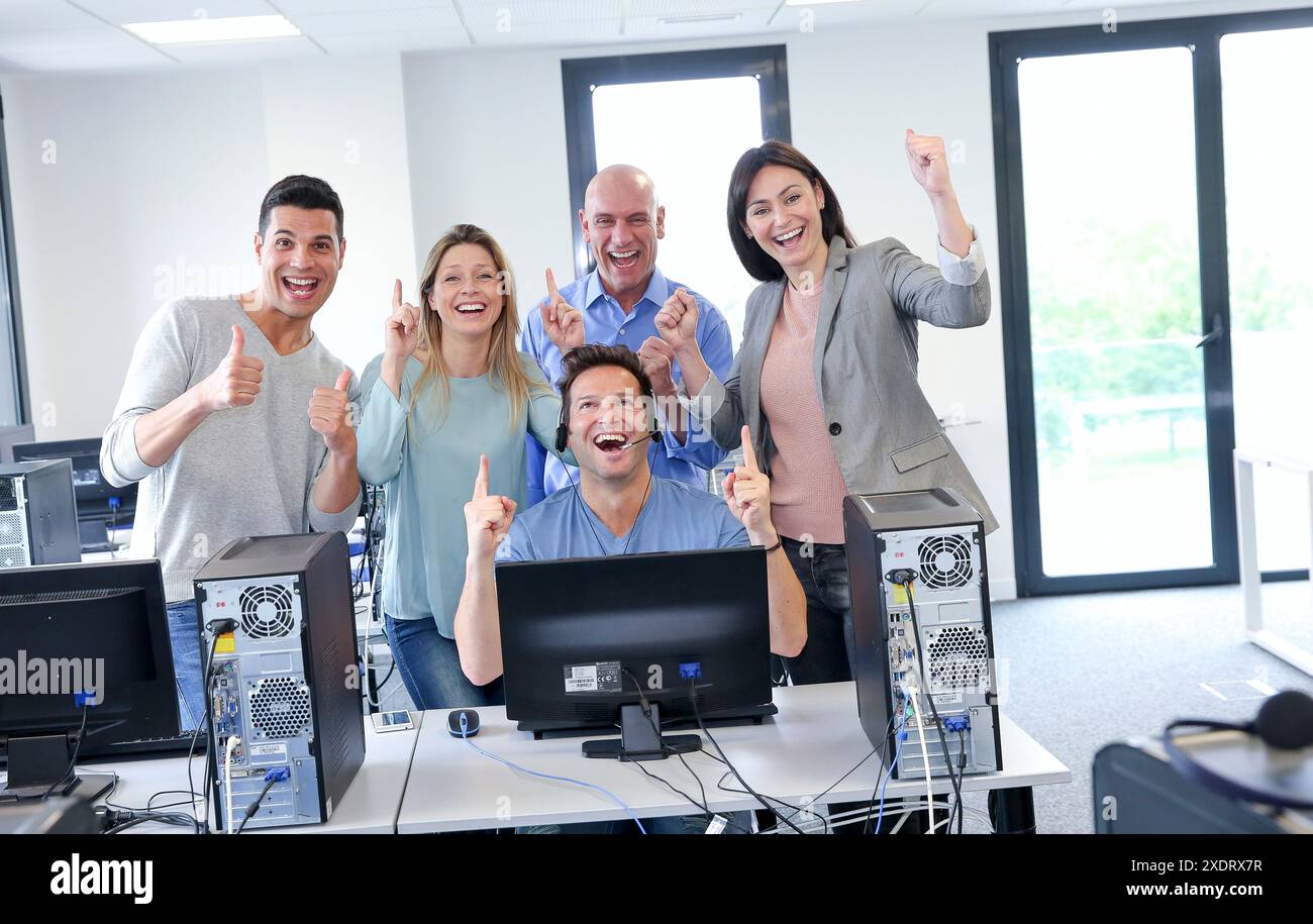 Team teachers. Computer Academy Stock Photo - Alamy