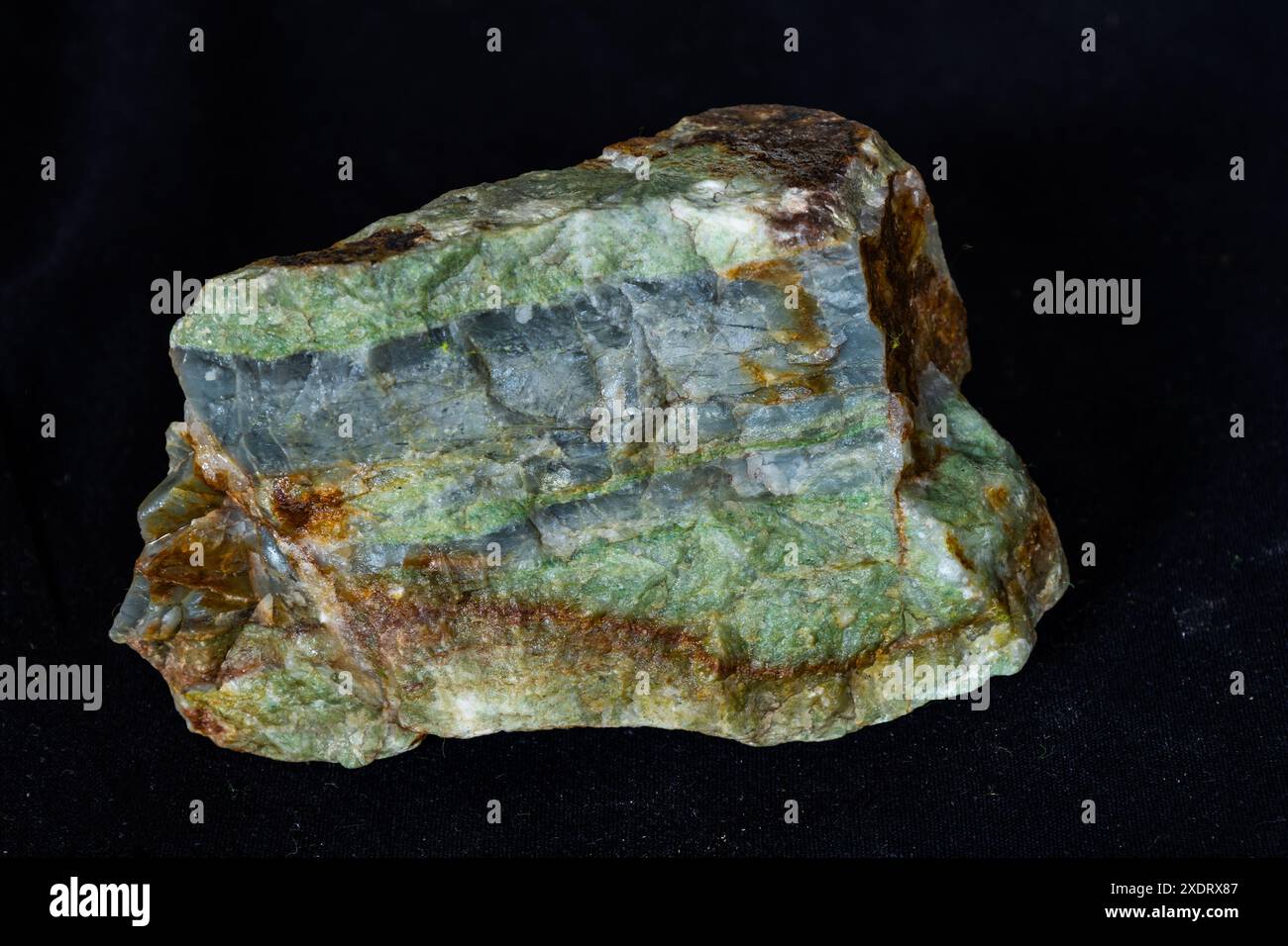Sample of Archean age interbedded barite and chert on a black ...
