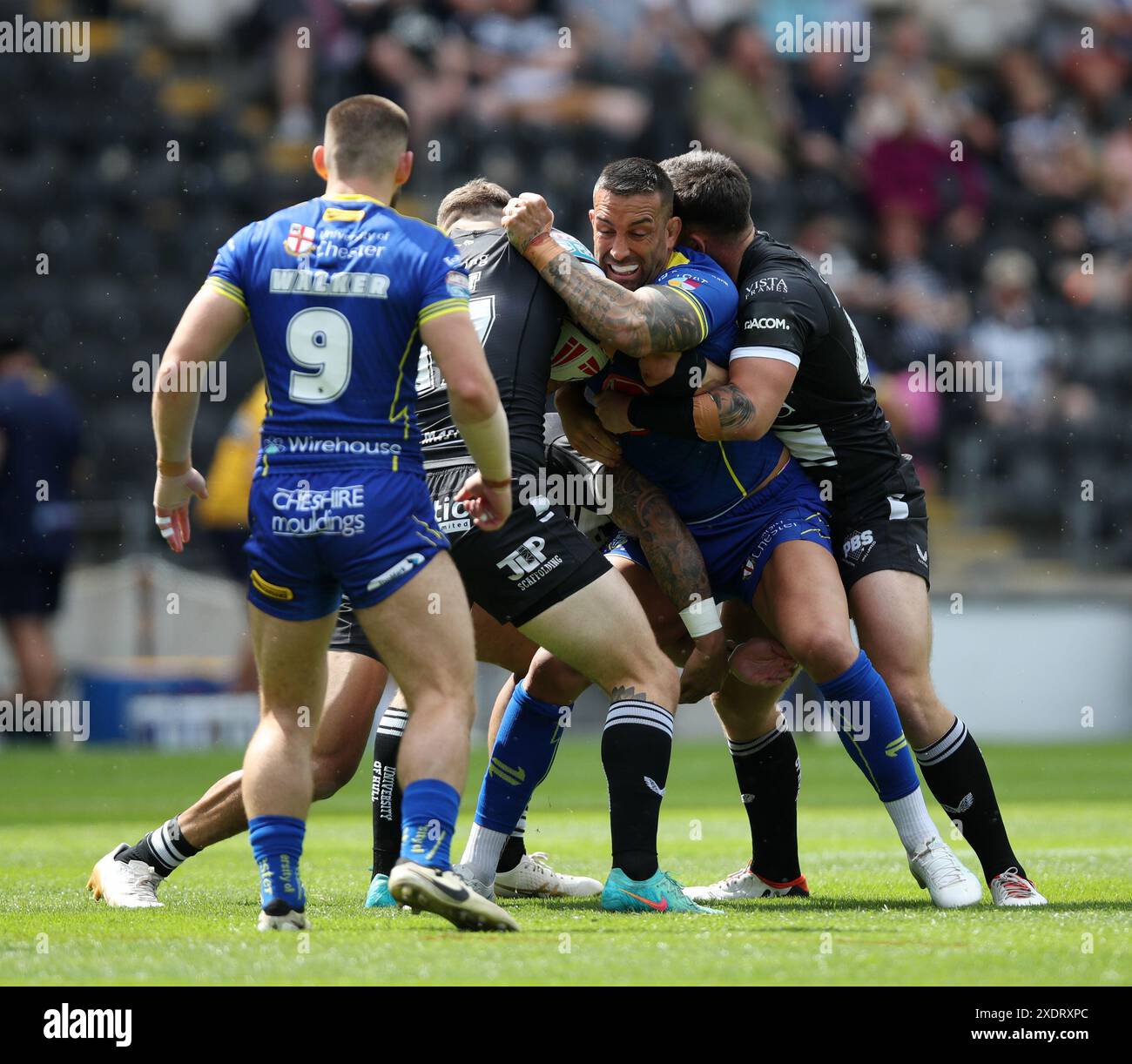 Warrington Wolves' Paul Vaughan is tackled during the Betfred Super ...