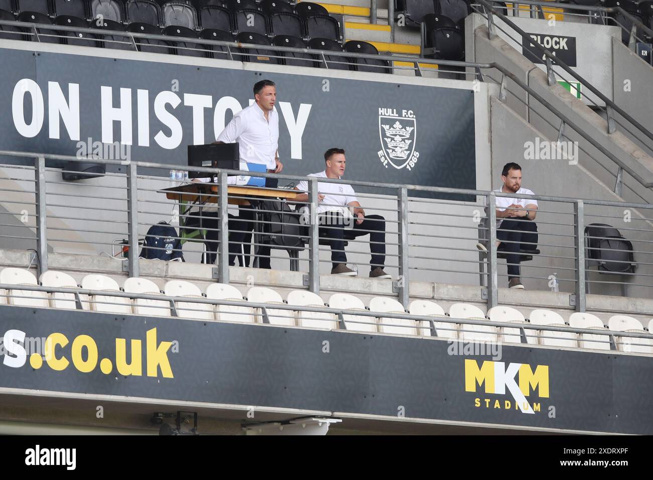 Warrington Wolves' Head Coach Sam Burgess (L) looks on from the stands during the Betfred Super ...