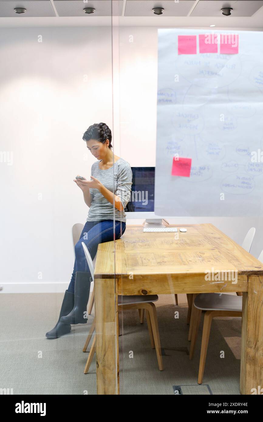 Executive woman in meeting room. Advertising agency Stock Photo - Alamy