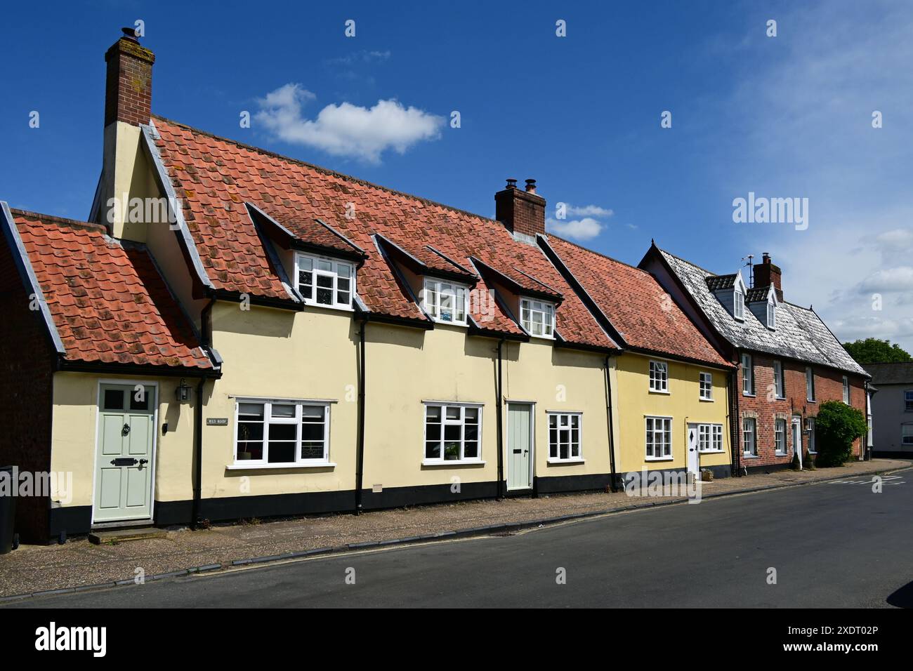 Terrace of old cottages in King Street, New Buckenham, Norfolk, England ...