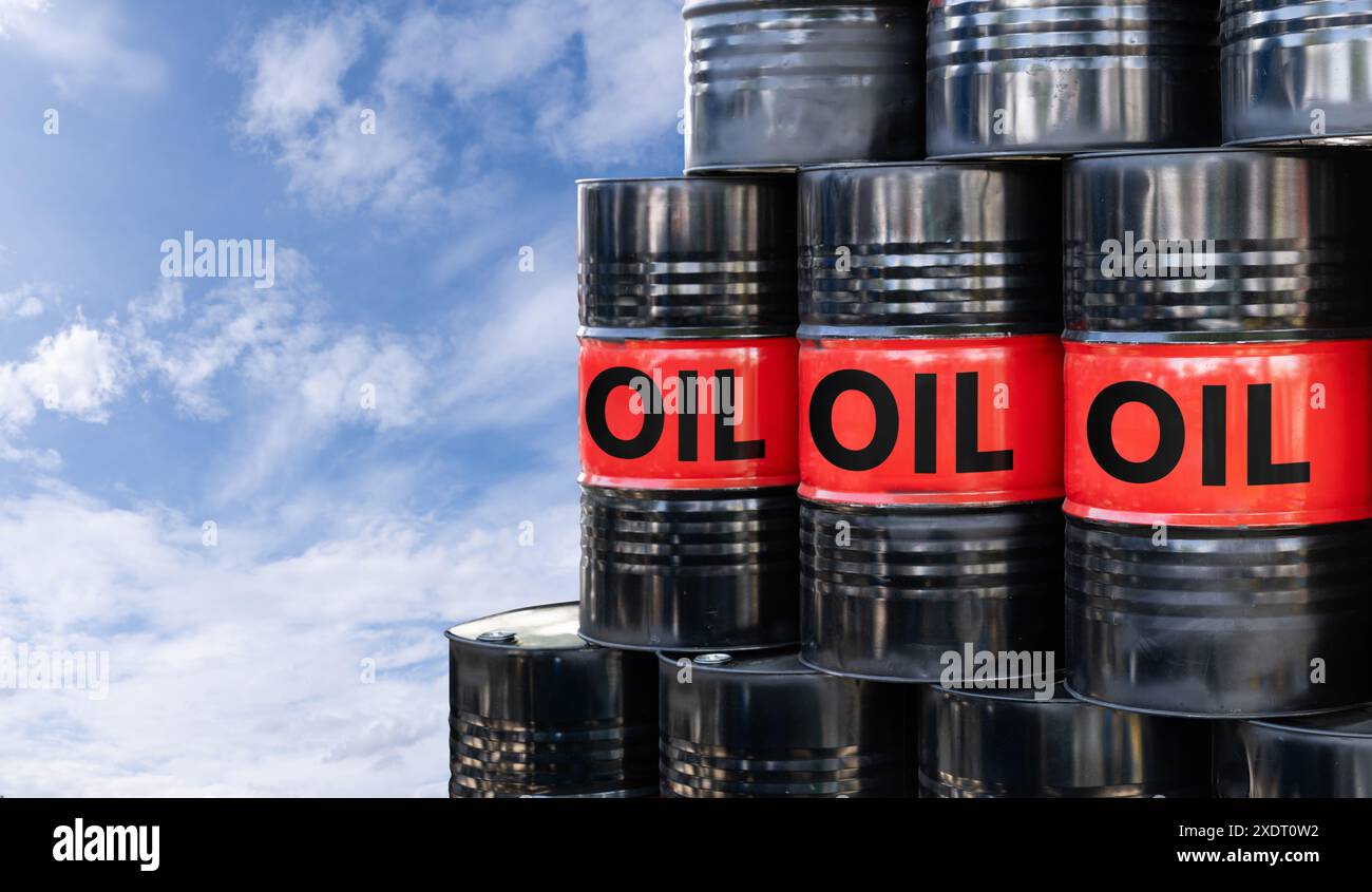 Stack of drums with crude oil Stock Photo - Alamy