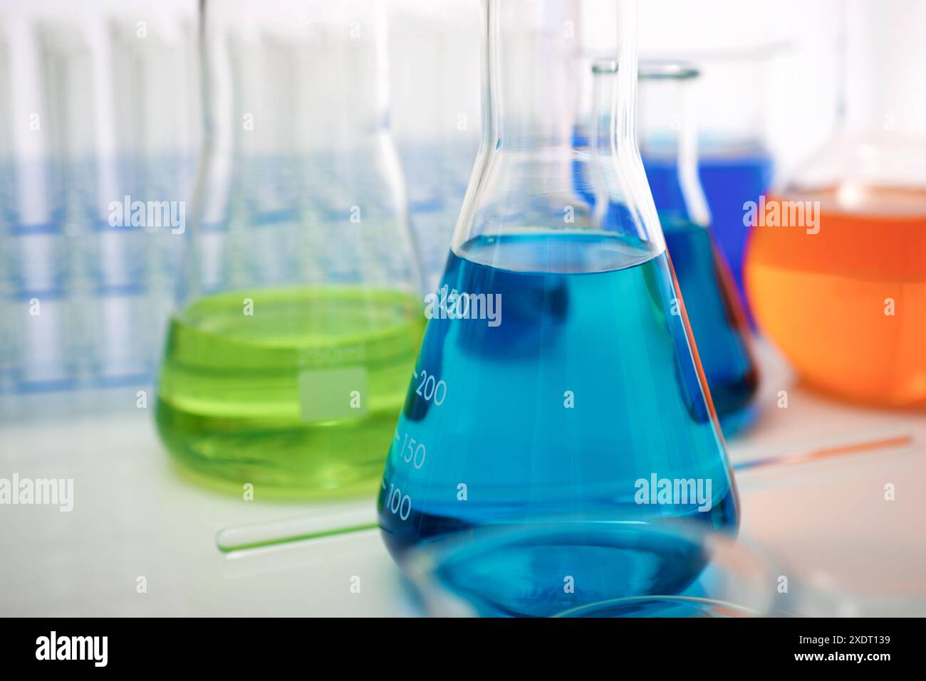 Close up of test-tube glass beaker with liquid standing on a laboratory ...