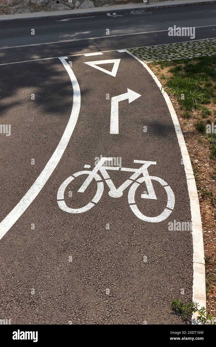 Bicycle lane signs Stock Photo - Alamy