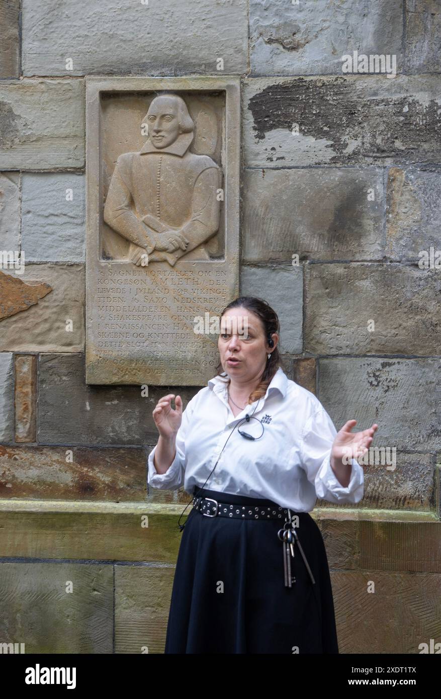Kronborg Castle tour guide with W. Shakespeare wall plaque in Helsingör ...