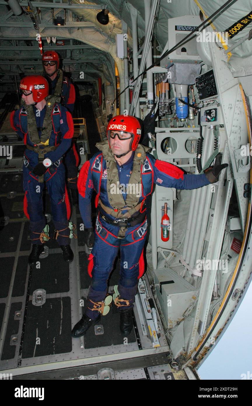 RAF Falcons parachute display team line up behind their Hercules ...
