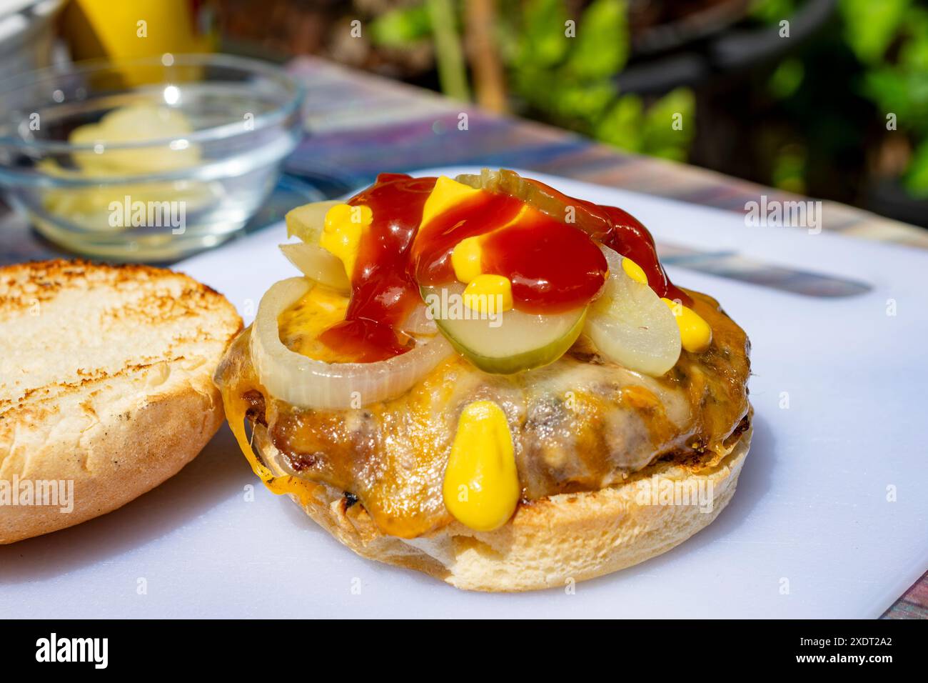 Straight from the grill, burger patty topped with cojack cheese ...