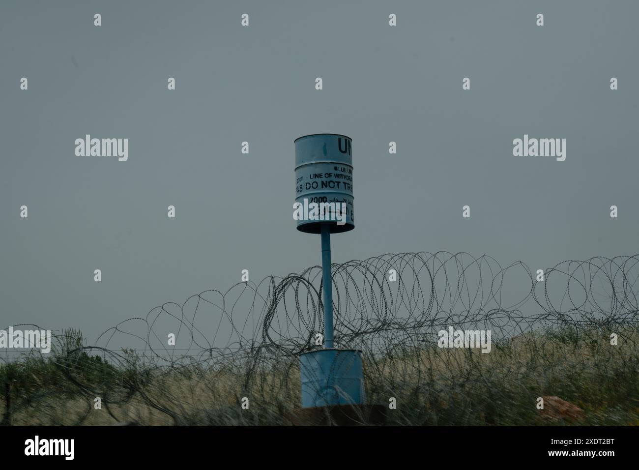 Kfarkela, Lebanon. 26th Apr, 2024. A blue barrel, written "UN, line of ...