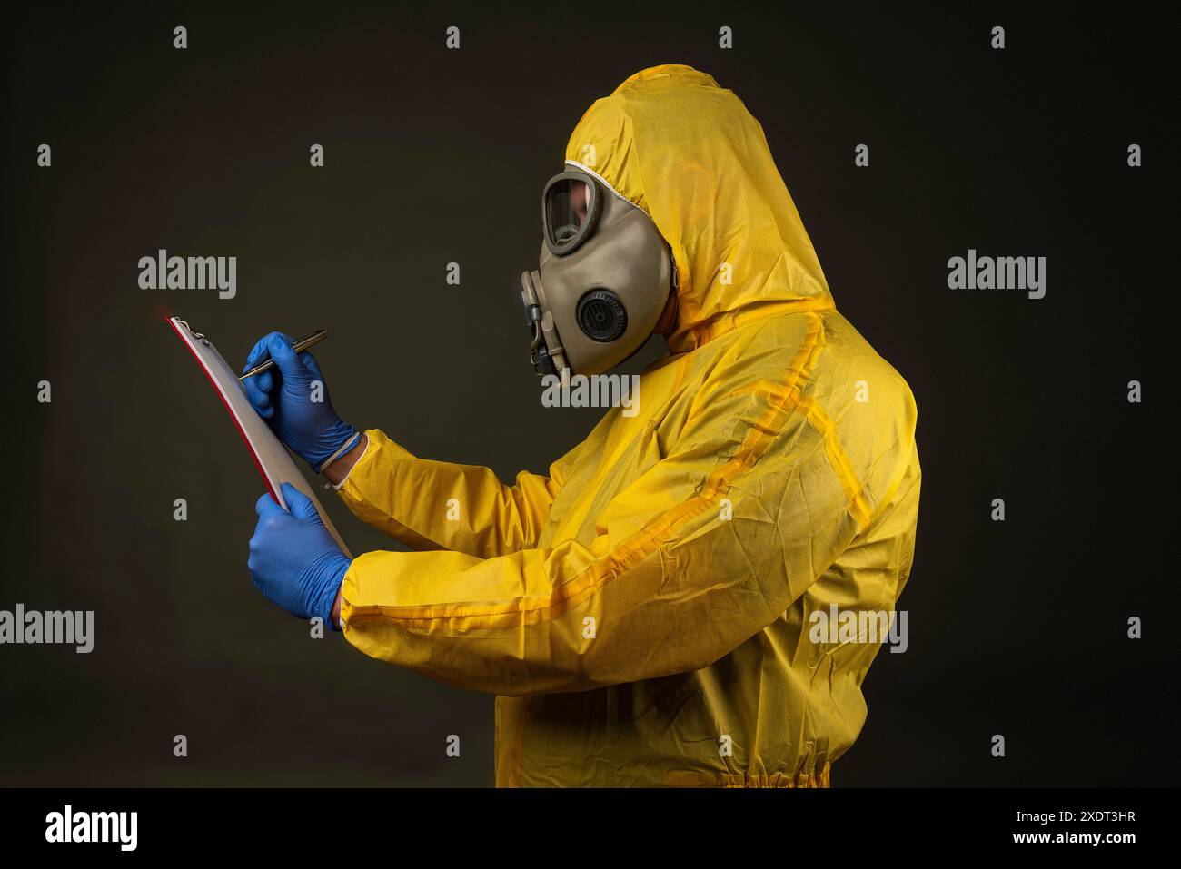 man in a protective suit with a gas mask during a disaster drill Stock ...