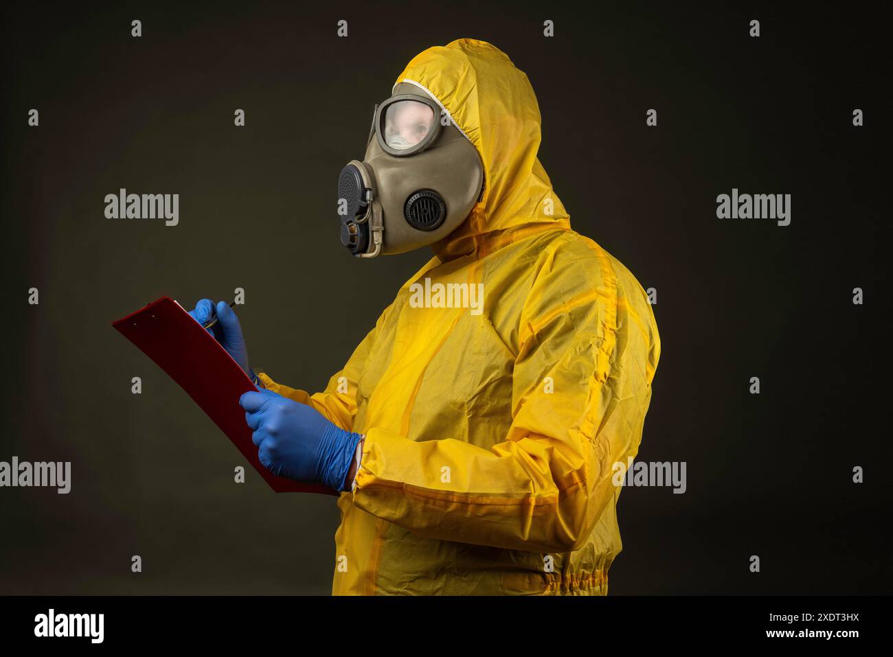 man in a protective suit with a gas mask during a disaster drill Stock ...