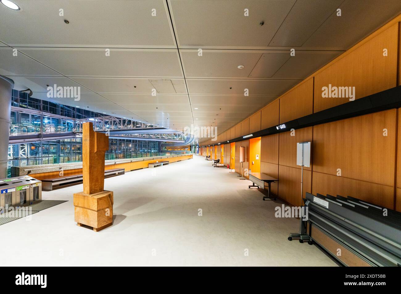 Interior of the Tokyo International Forum building at night. View along ...