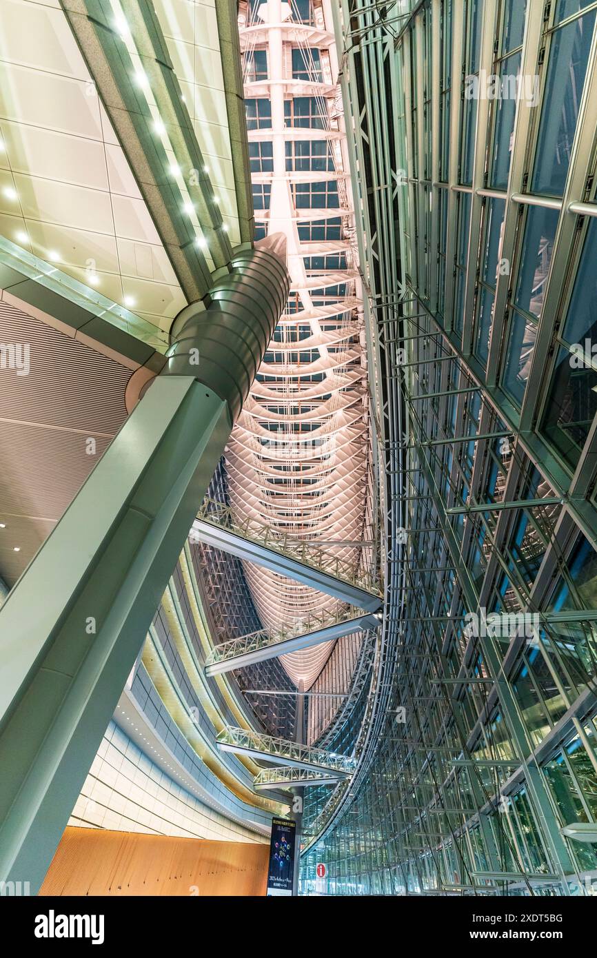 Interior of the Tokyo International Forum at night. View up the roof ...
