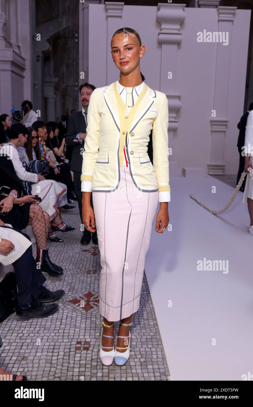 Mia Regan poses for photographers at the Thom Browne Haute Couture Fall ...